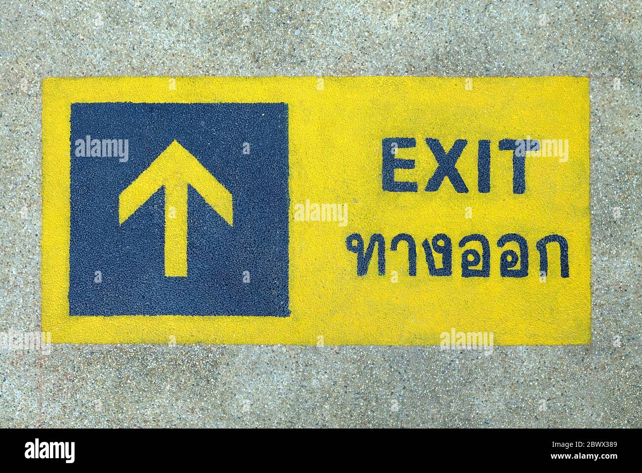 Close up Exit Sign on the Ground Stock Photo - Alamy
