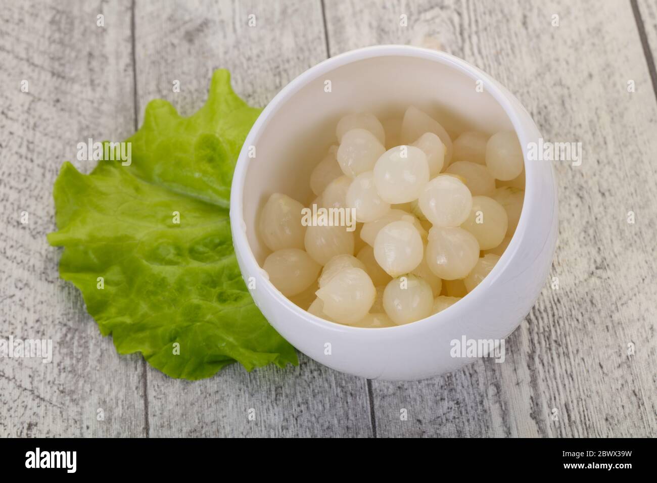 Pickled baby onion in the bowl Stock Photo - Alamy