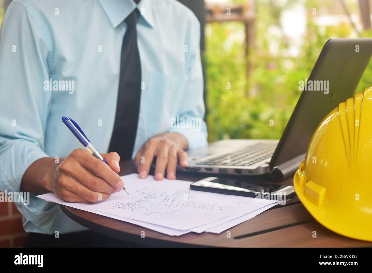 Construction engineers are working to design the building structure ...