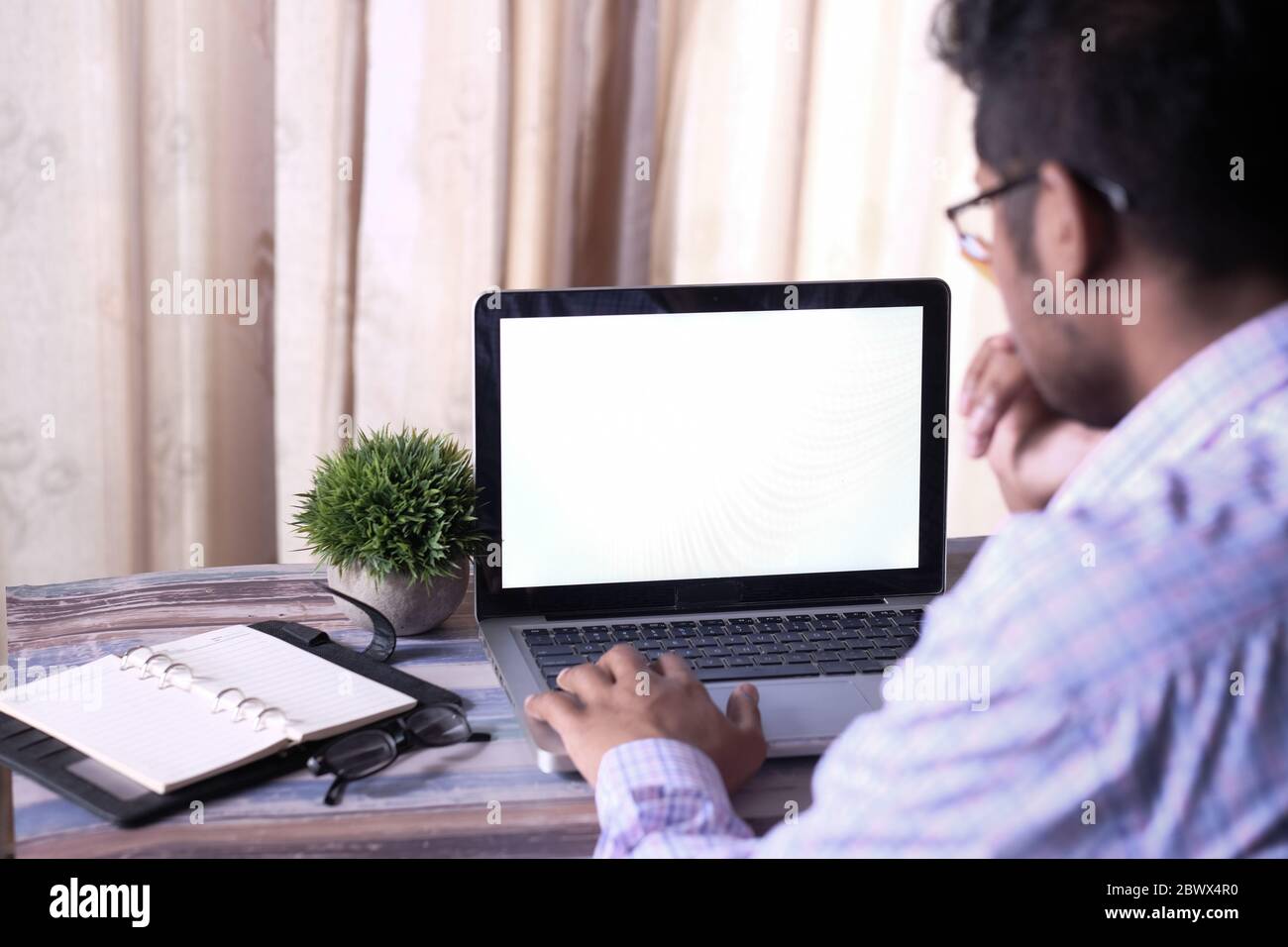 Person working computer screen back hi-res stock photography and images ...