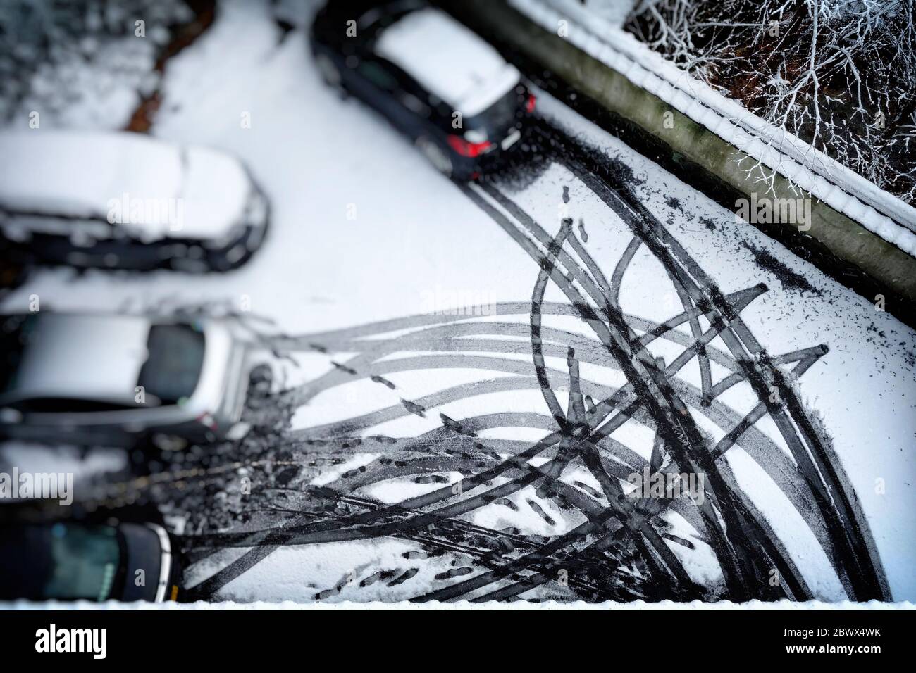 Top View of Car Tracks on the Snow Covered Road Background Stock Photo ...