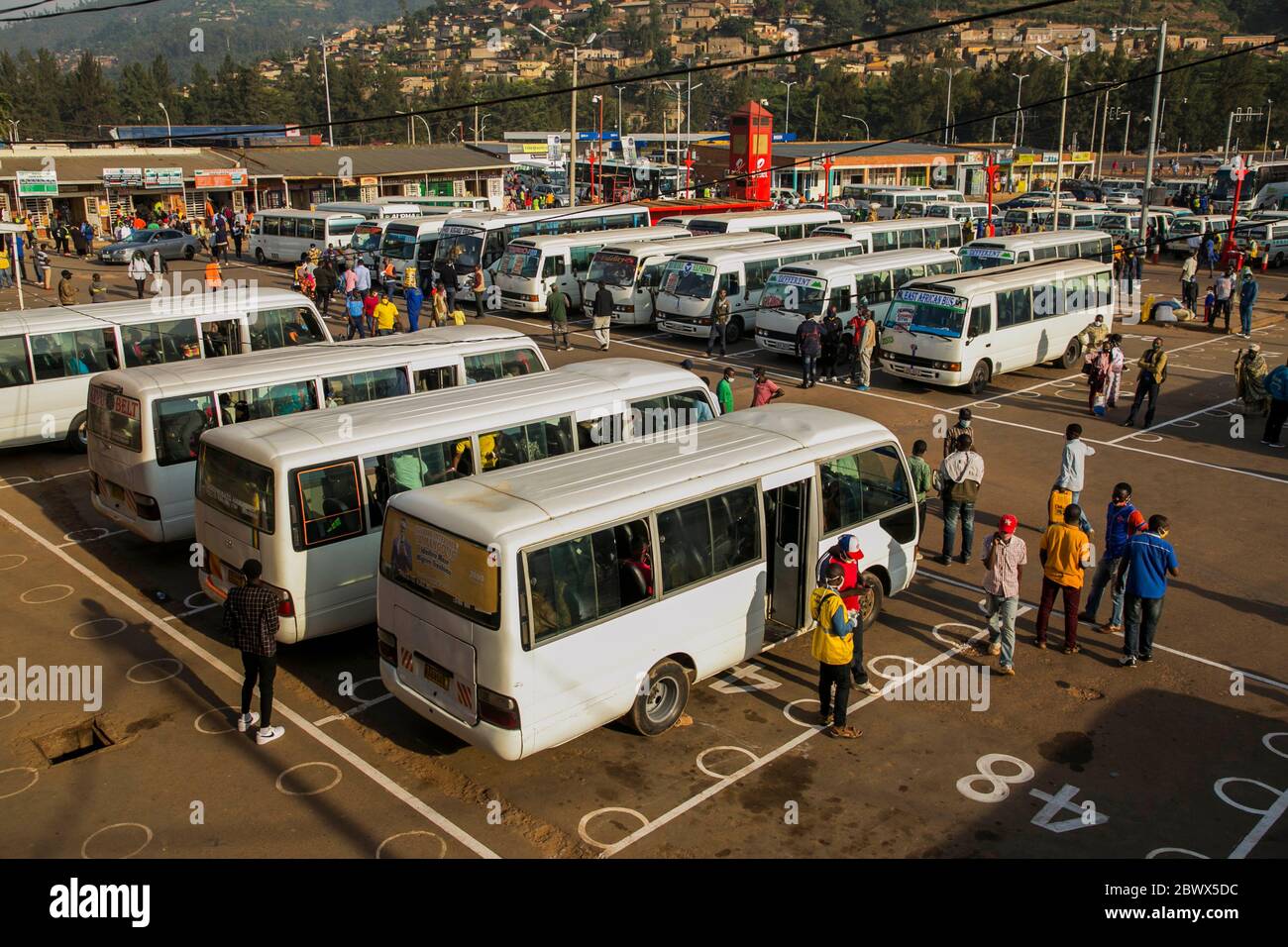 Kigali, Rwanda. 3rd June, 2020. Buses and passengers are seen at a main ...