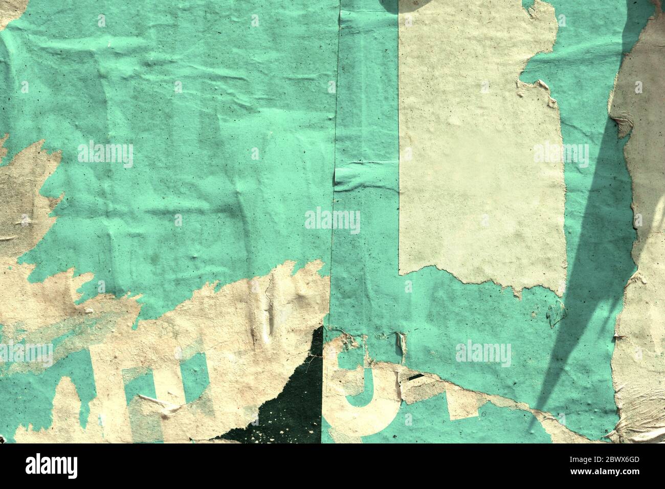 Old ripped torn posters grunge texture background creased crumpled ...