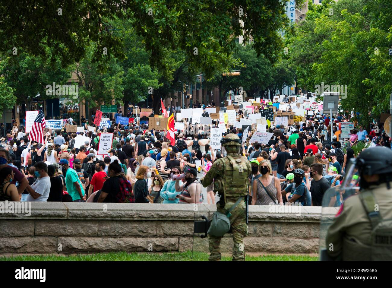 Protesters gather outside the Texas State Capitol building as National ...
