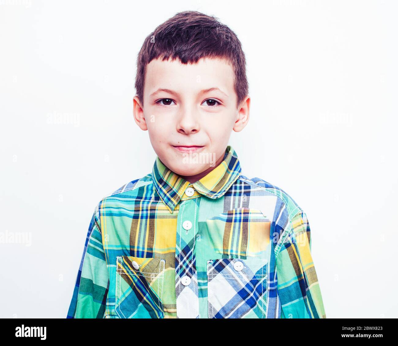 little cute real boy on white background gesture smiling close up ...