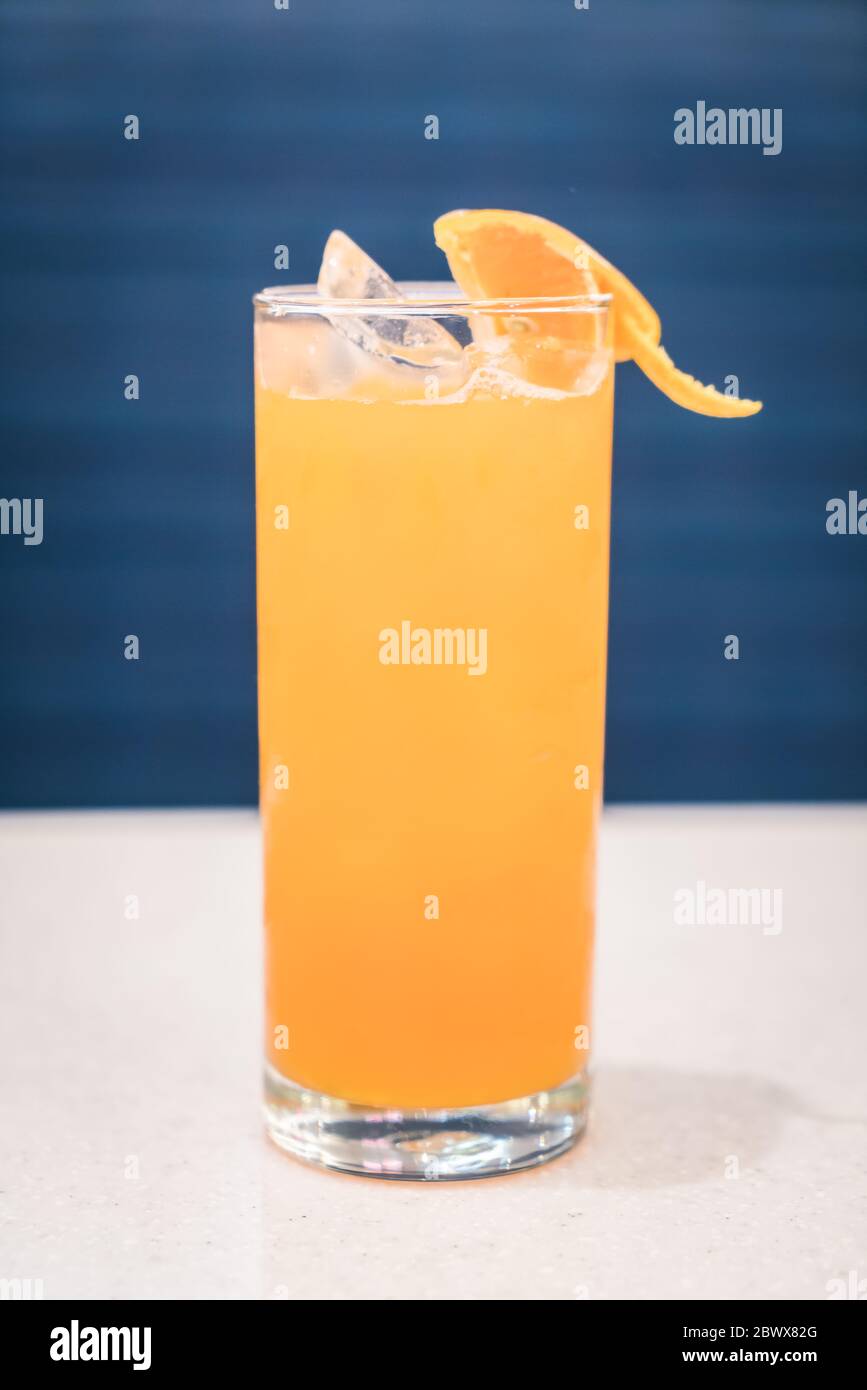Orange juice glass - filter effect Stock Photo - Alamy