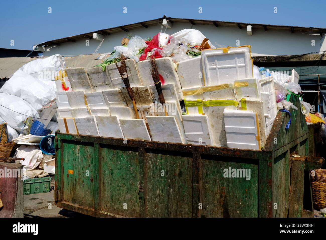 Pile of Garbage in Big Container at Fresh Market Stock Photo - Alamy