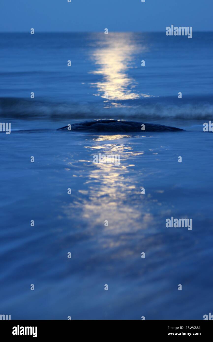 Dawn view full moon setting hi-res stock photography and images - Alamy