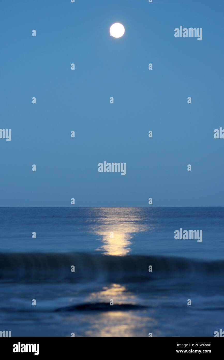 Dawn View Full Moon Setting High Resolution Stock Photography and ...