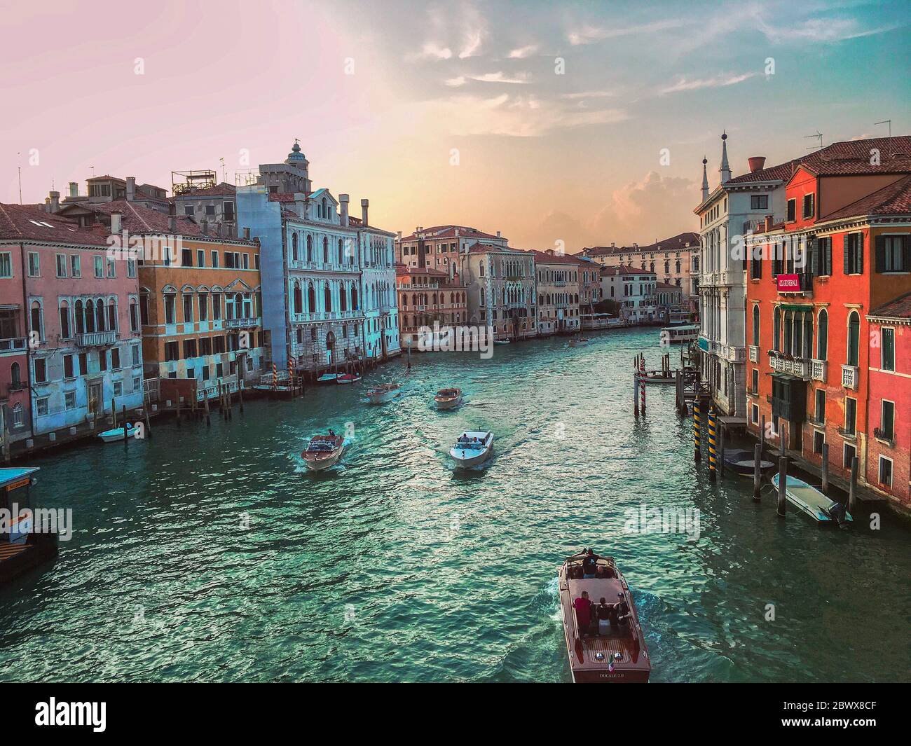 Venice harbor next to a Grand Canal in the background. Beautiful sky ...