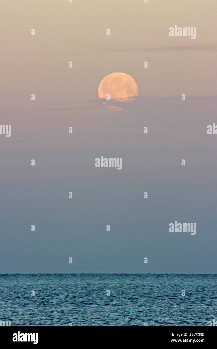 Dawn View Full Moon Setting High Resolution Stock Photography and ...