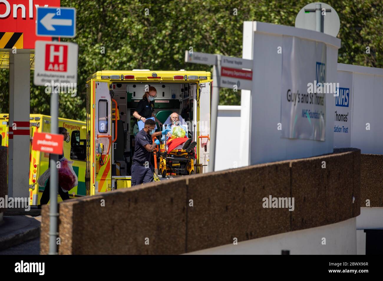 As Lockdown was eased Man with breathing mask and oxygen is wheeled out ...