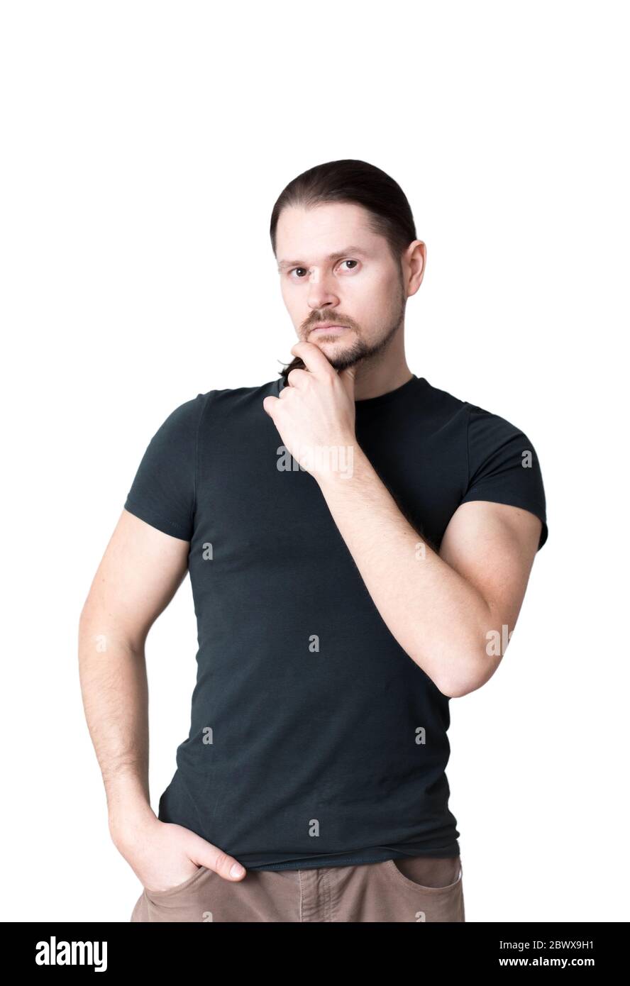 Portrait of a pensive man in studio isolated on a white background ...