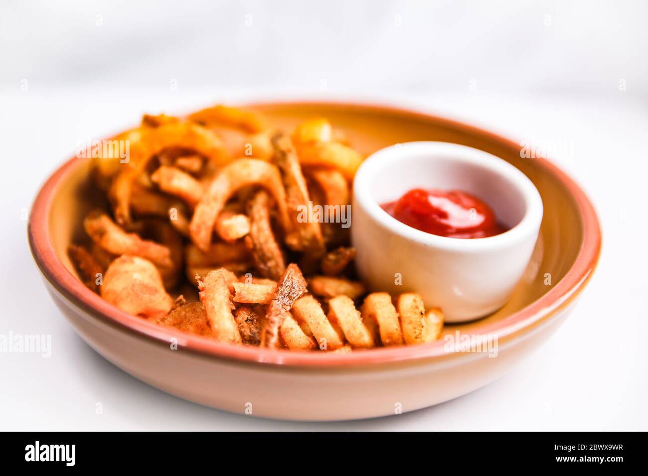 Curly fries hi-res stock photography and images - Alamy