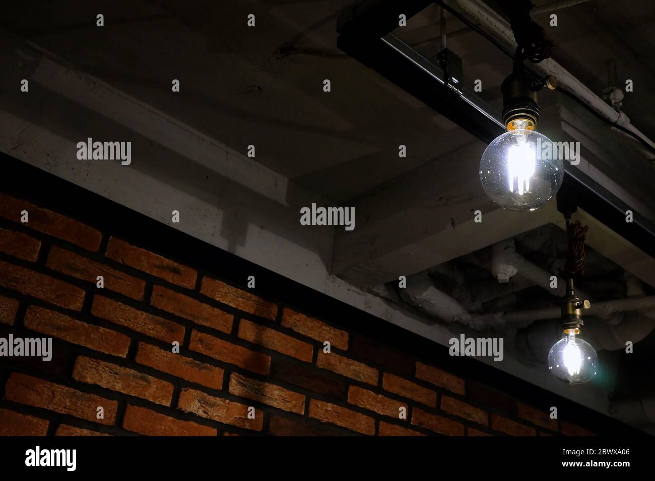 Dusted LIght Bulb on Ceiling in Basement Stock Photo - Alamy
