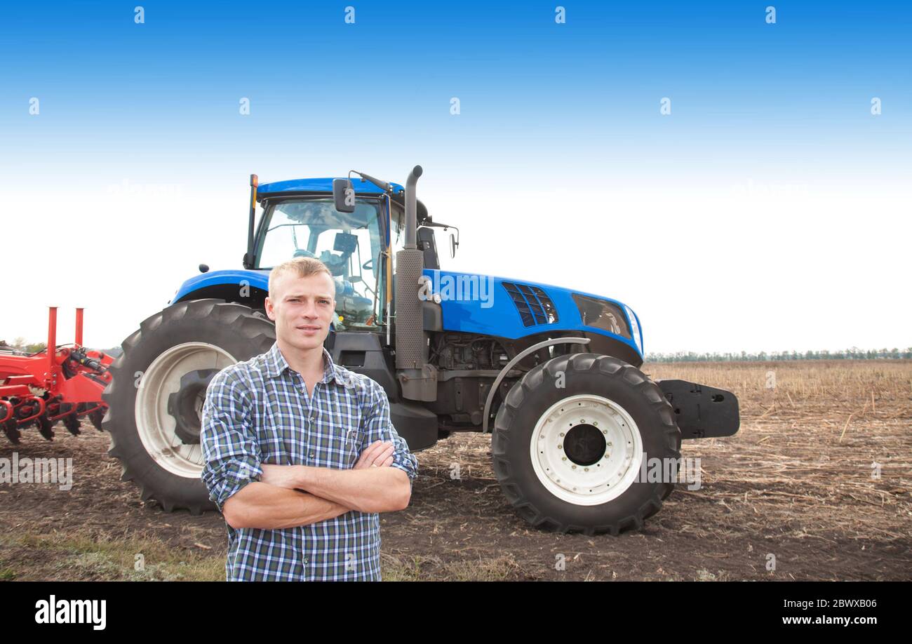 Man works near tractor in hi-res stock photography and images - Alamy