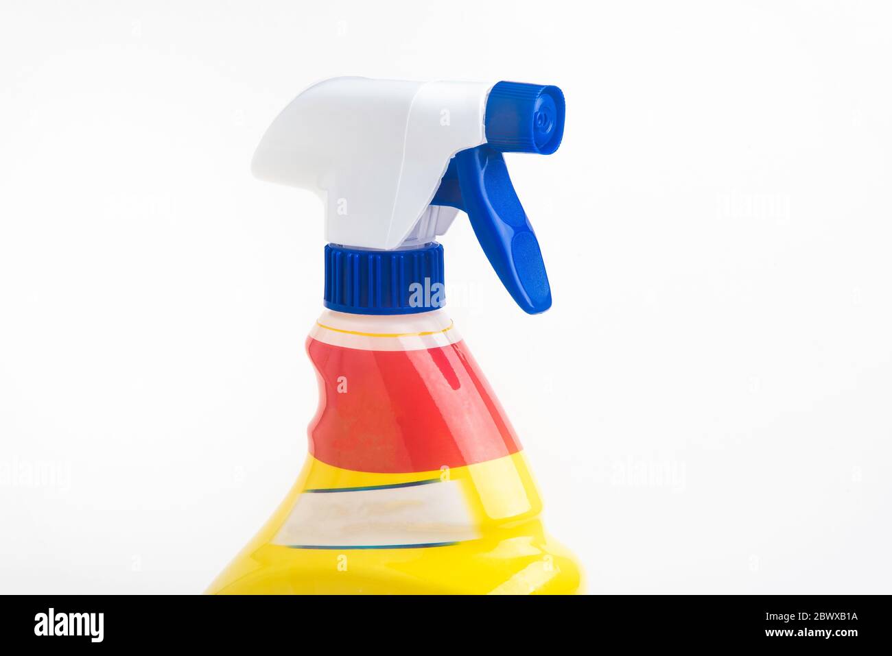 A close-up of the top portion of a red, white, and blue liquid spray ...