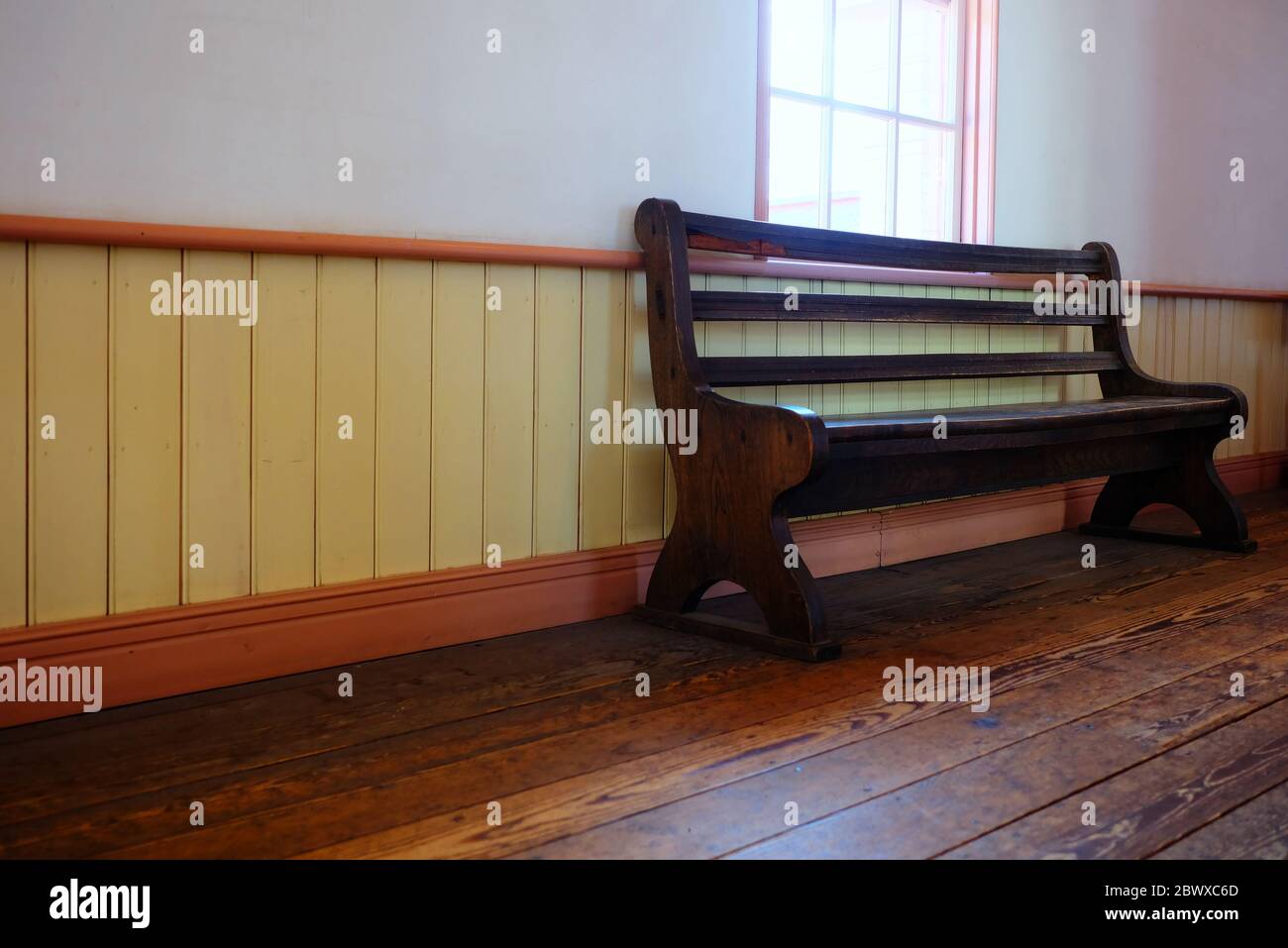 Vintage Wooden Bench Seat at the Hall Wall Stock Photo - Alamy