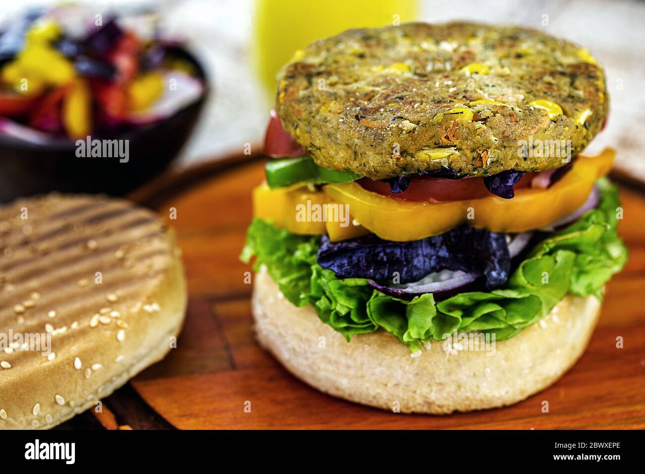 Vegan hamburger, Sandwich made without meat, with glass of green juice ...