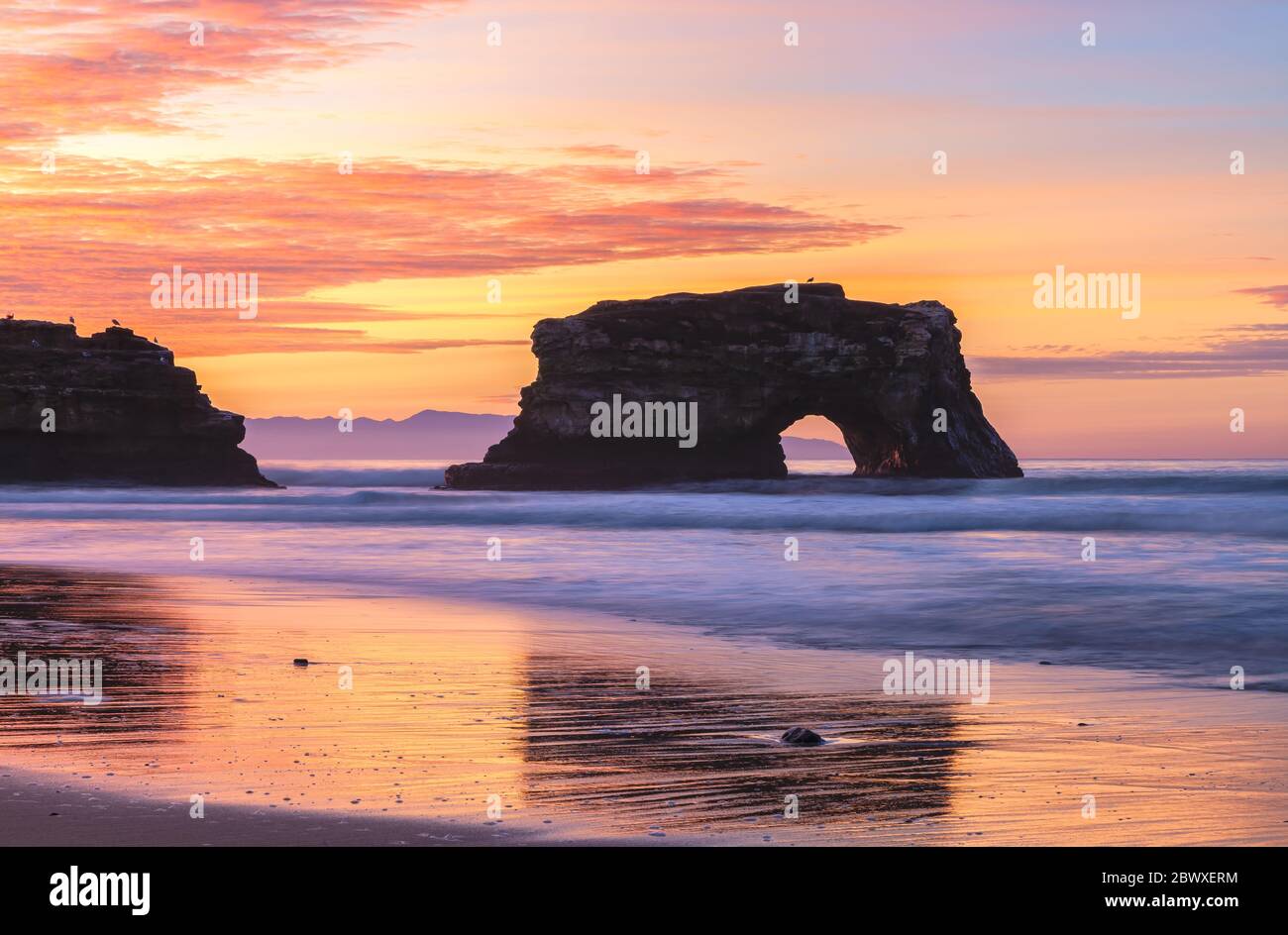 Silhouette Natural Bridge Rock at Natural Bridge State Beach, Santa ...