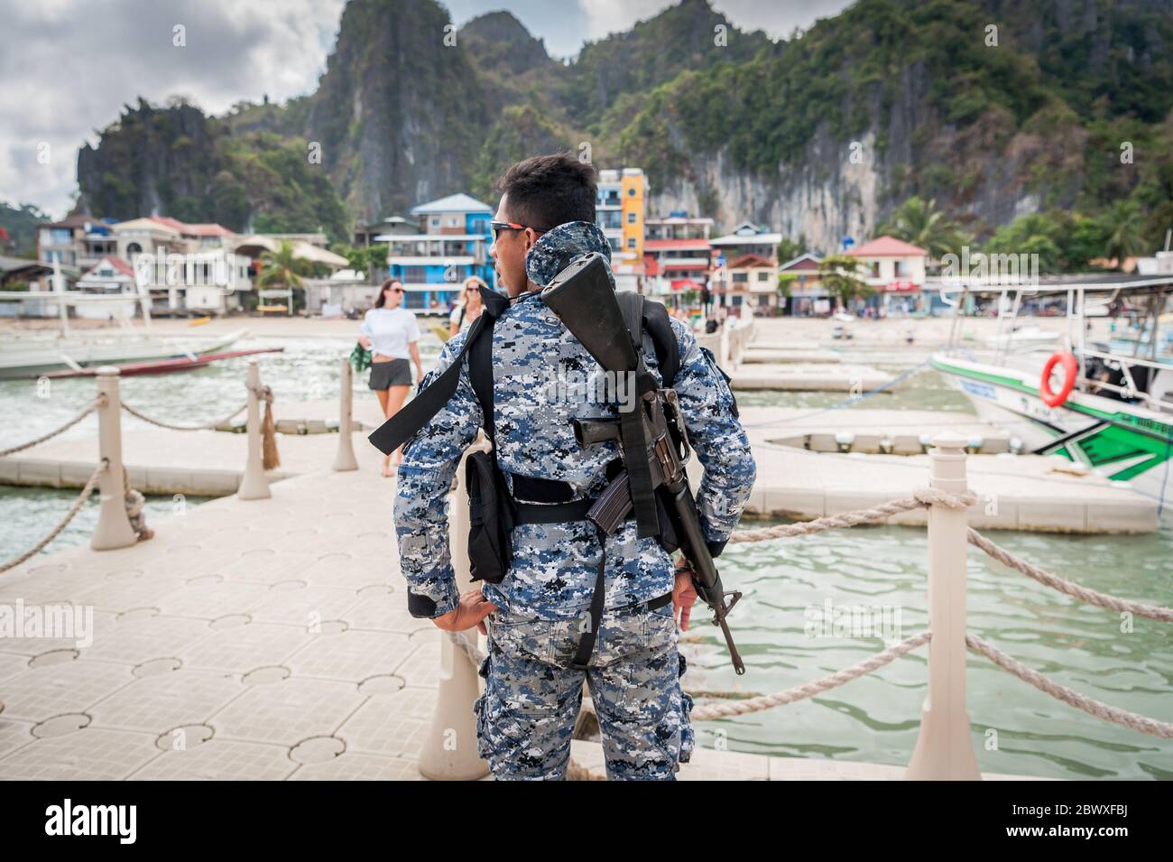 Filipino security guard with gun hi-res stock photography and images ...