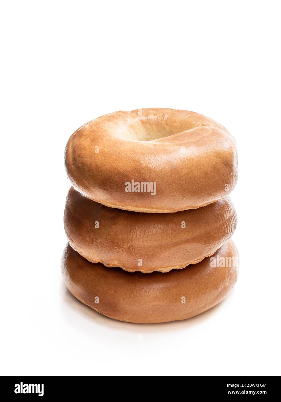 Stack of bagels isolated on white background Stock Photo - Alamy