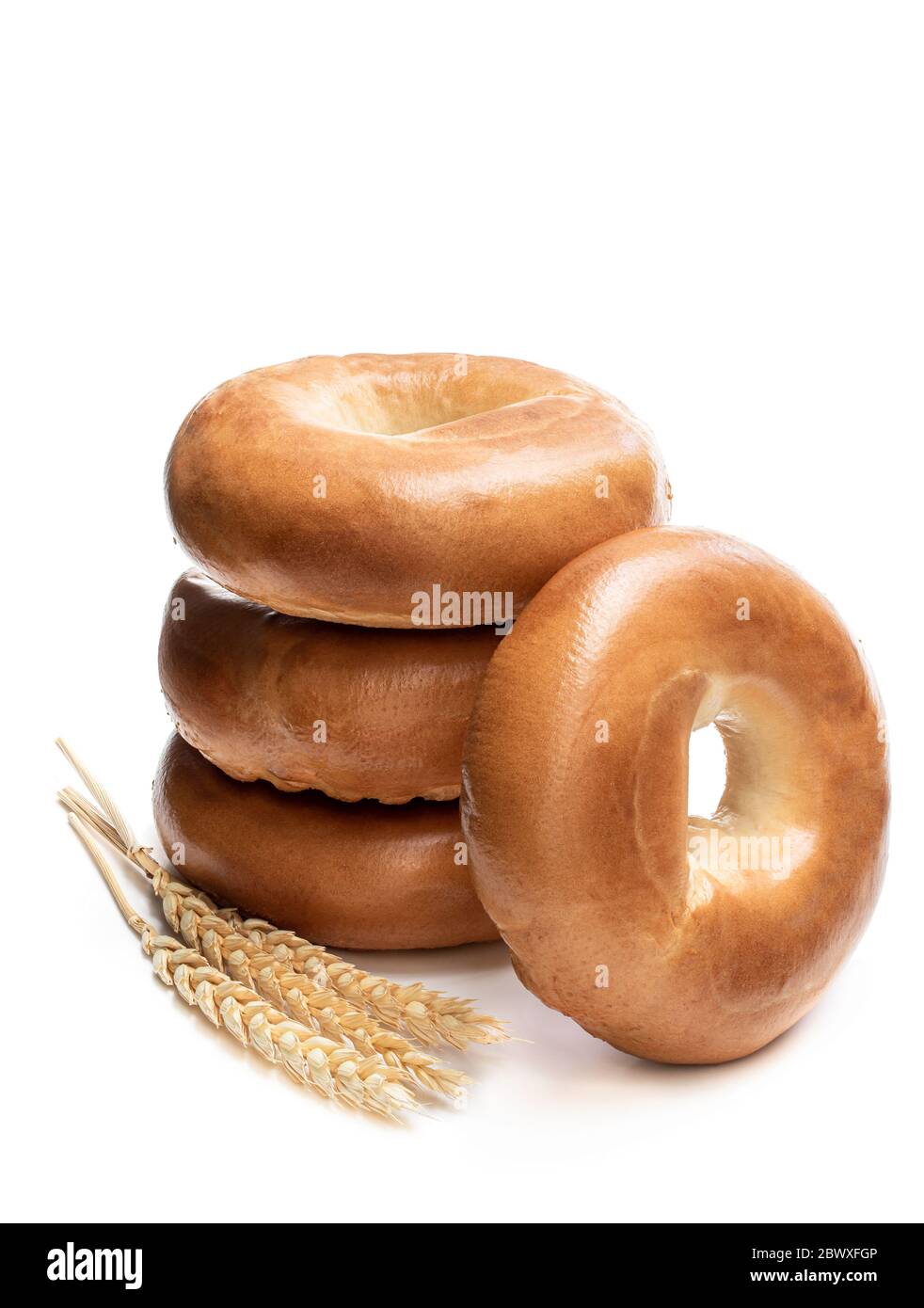 Stack of bagels isolated on white background Stock Photo - Alamy