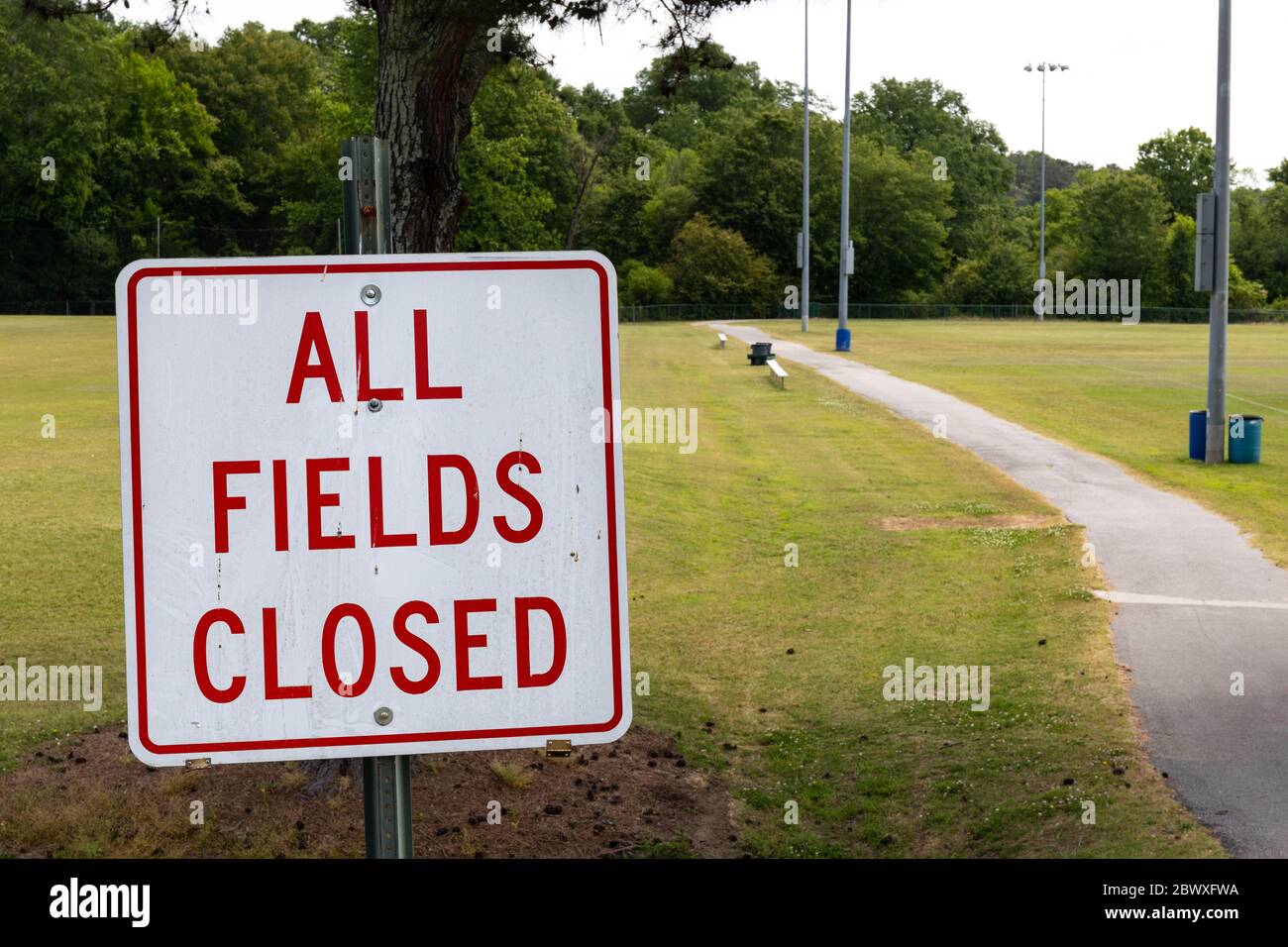 Sign indicating All Fields Closed at a sports and recreation area ...