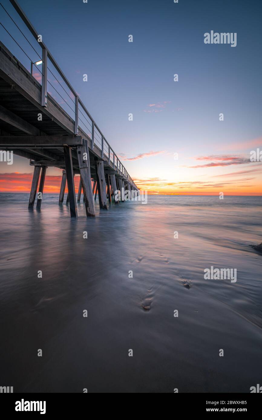 Beautiful sunset over wooden jetty hi-res stock photography and images ...