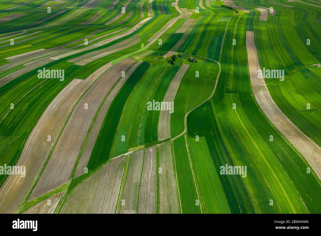 Poland from above. Aerial view of green agricultural fields and village ...