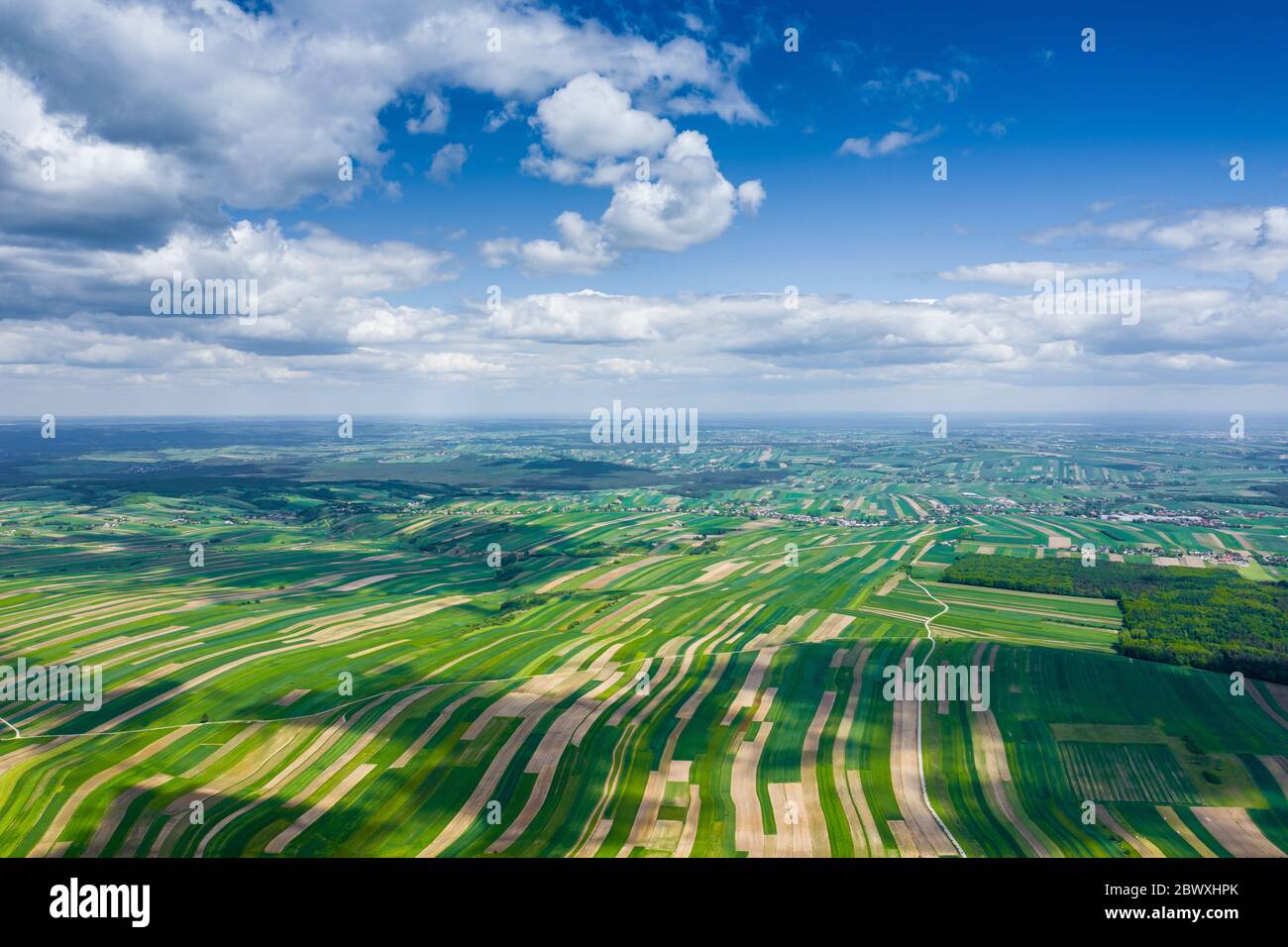 Poland from above. Aerial view of green agricultural fields and village ...
