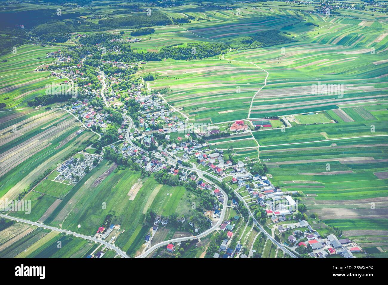 Poland from above. Aerial view of green agricultural fields and village ...