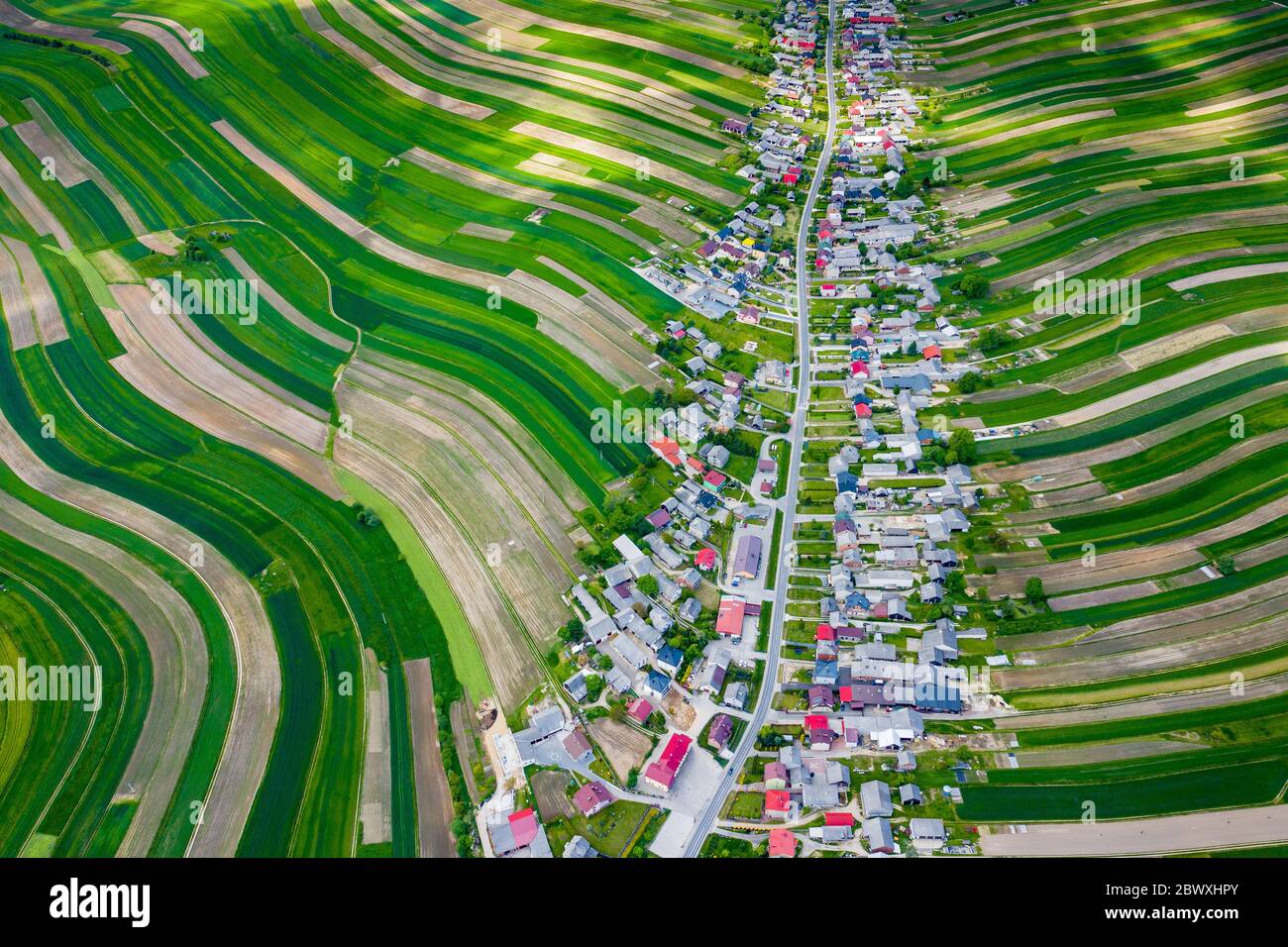 Poland from above. Aerial view of green agricultural fields and village ...