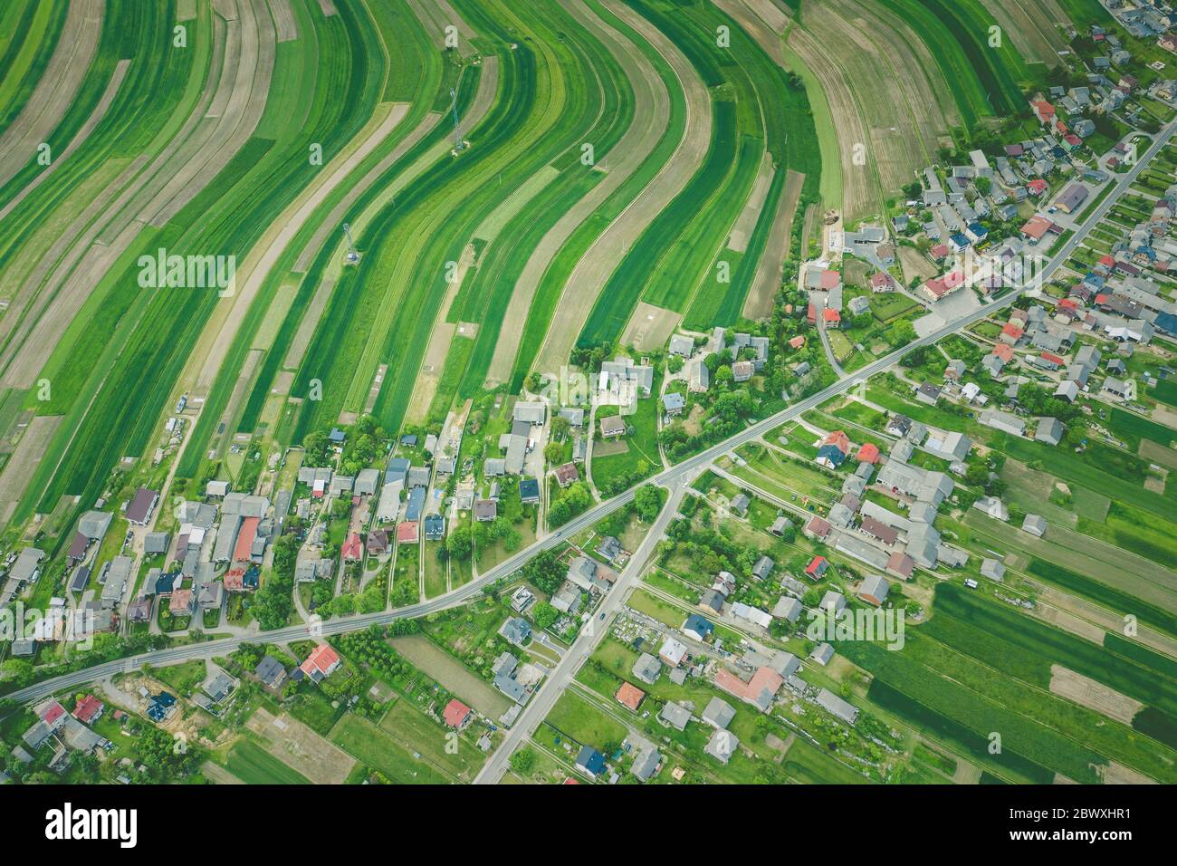 Poland from above. Aerial view of green agricultural fields and village ...