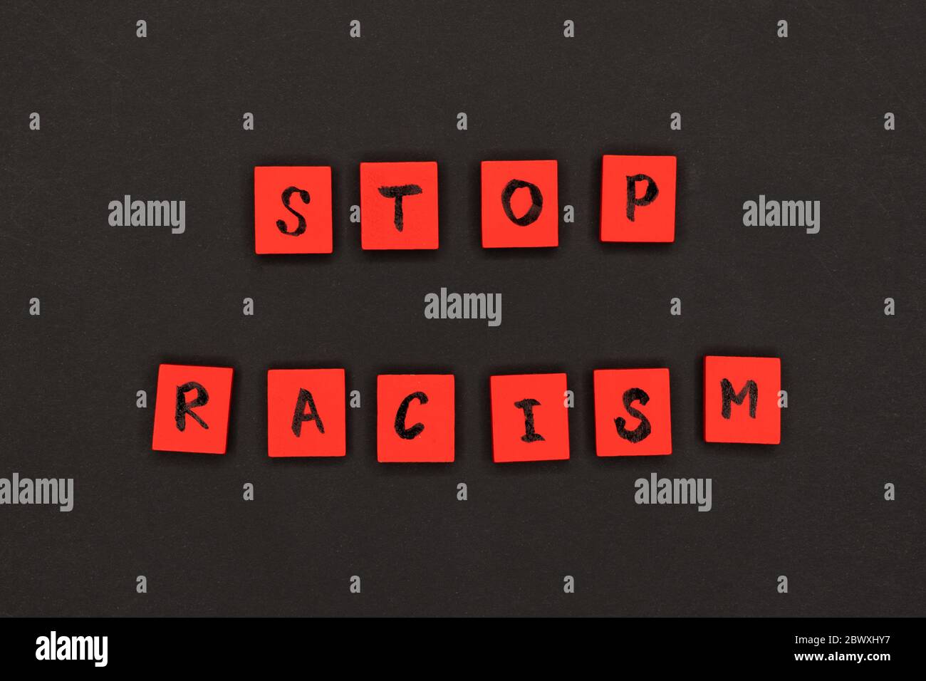 inscription stop racism. protest signs. lettering. red letters on ...