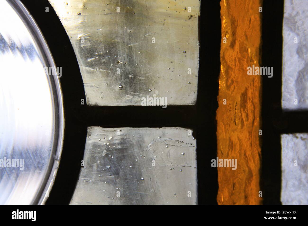 Stained glass window detail in catholic church Stock Photo - Alamy