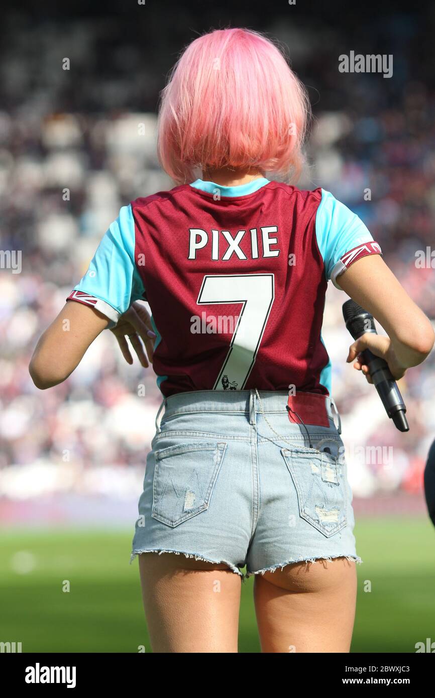 Pixie Lott stepped onto the football pitch at half time during West Ham ...