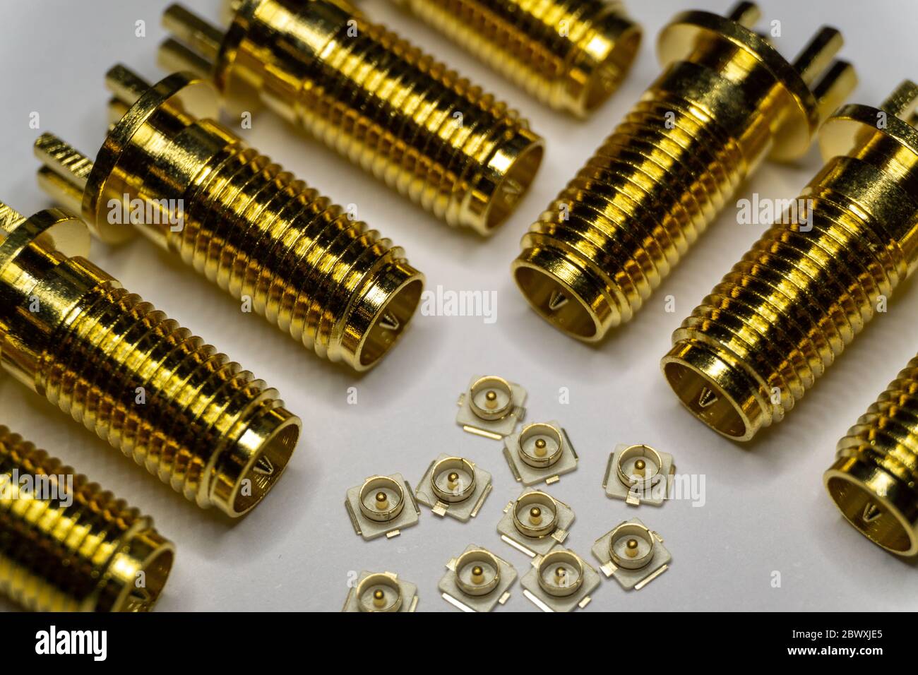 Close-up of symmetric aligned gold plated uFL micro precision radio ...