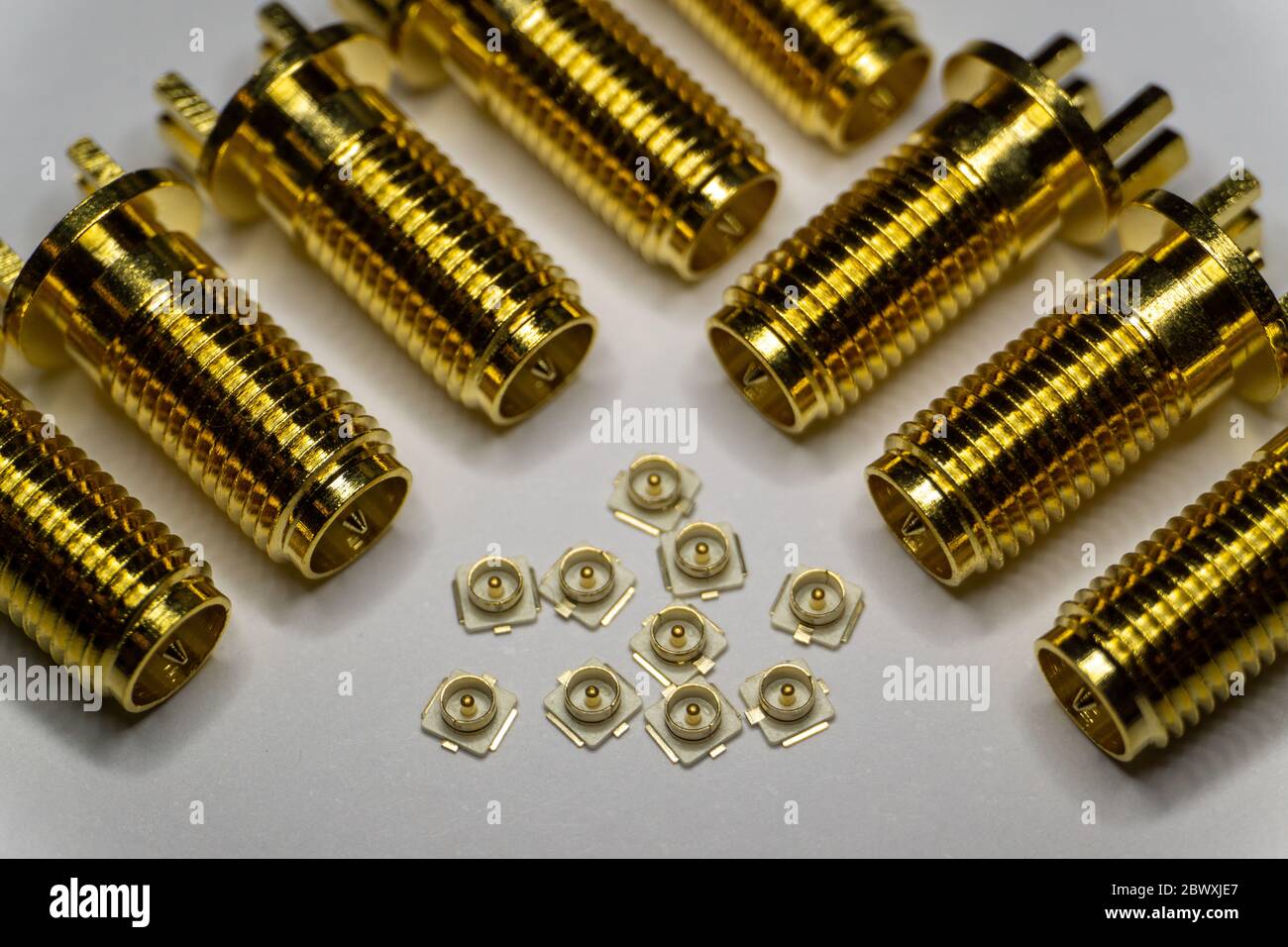 Close-up of symmetric aligned gold plated uFL micro precision radio ...