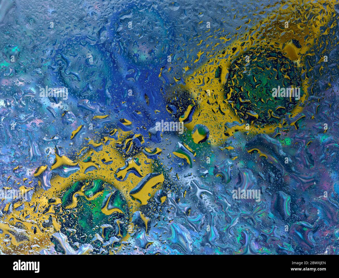 Water droplet patterns on hard surface with colourful background Stock ...