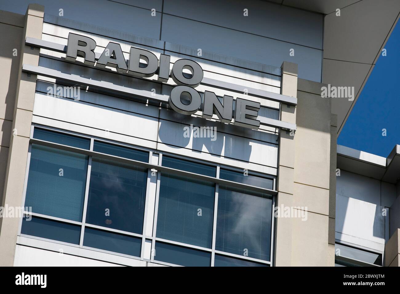 A logo sign outside of the headquarters of Radio One, also known as ...