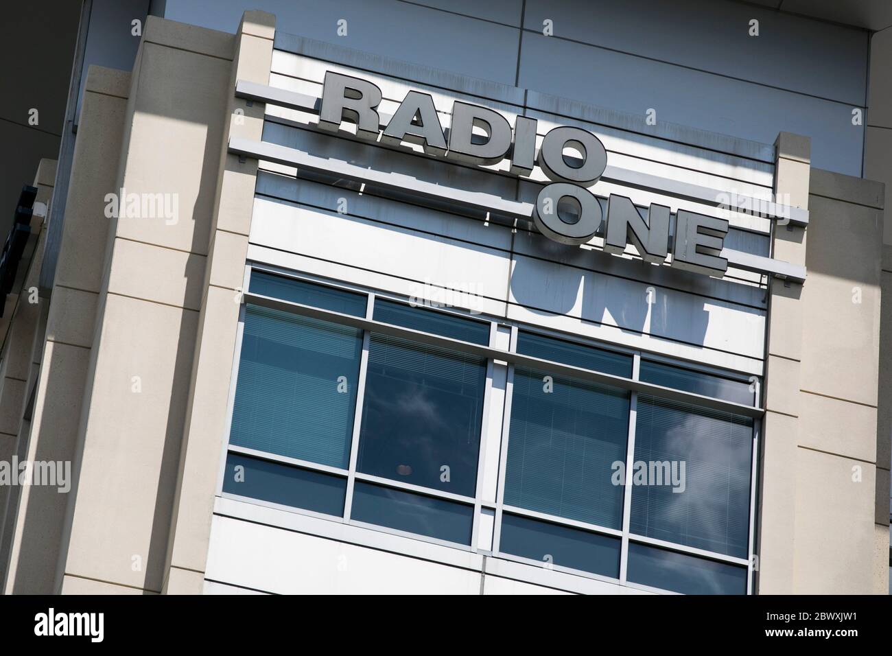 A logo sign outside of the headquarters of Radio One, also known as ...