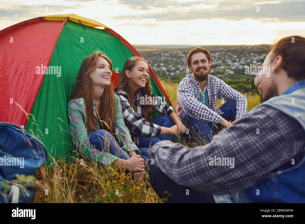 Camping tent camp people tourists sitting the sunset in nature Stock ...