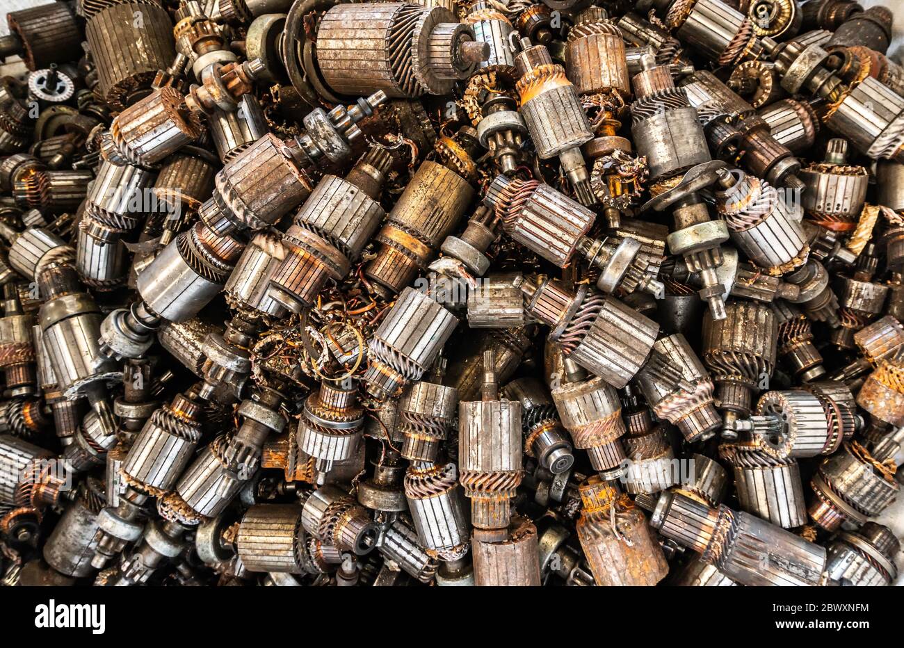 scrap yard of car's start motor rotor for recycling Stock Photo - Alamy