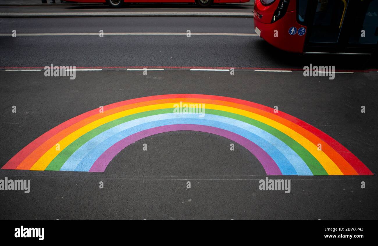 Rainbow in a bus lane Stock Photo - Alamy