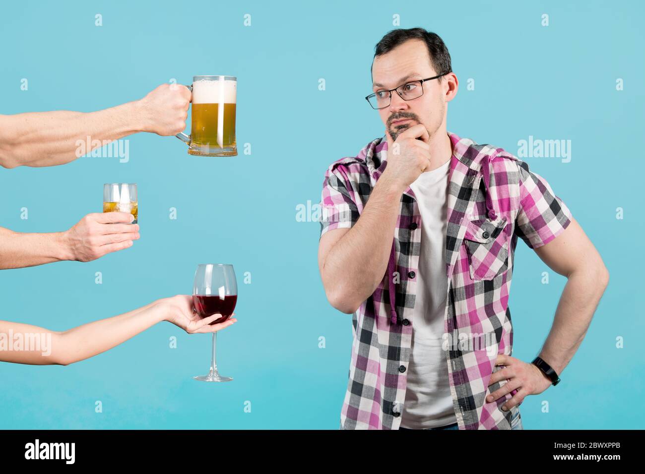 men are offered different alcoholic drinks, he faces a choice Stock ...