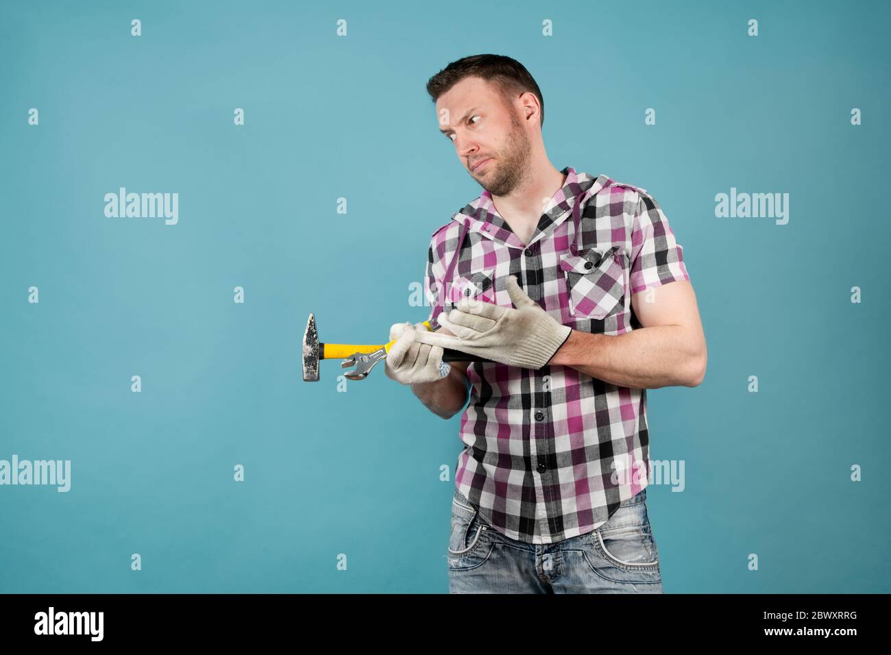 a dirty laborer is very dissatisfied with something at the end of the ...