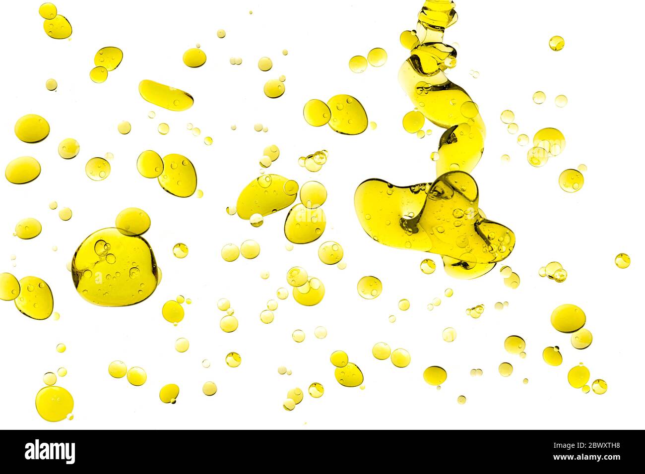 Olive oil drops. Closeup bubbles in water isolated on white background ...