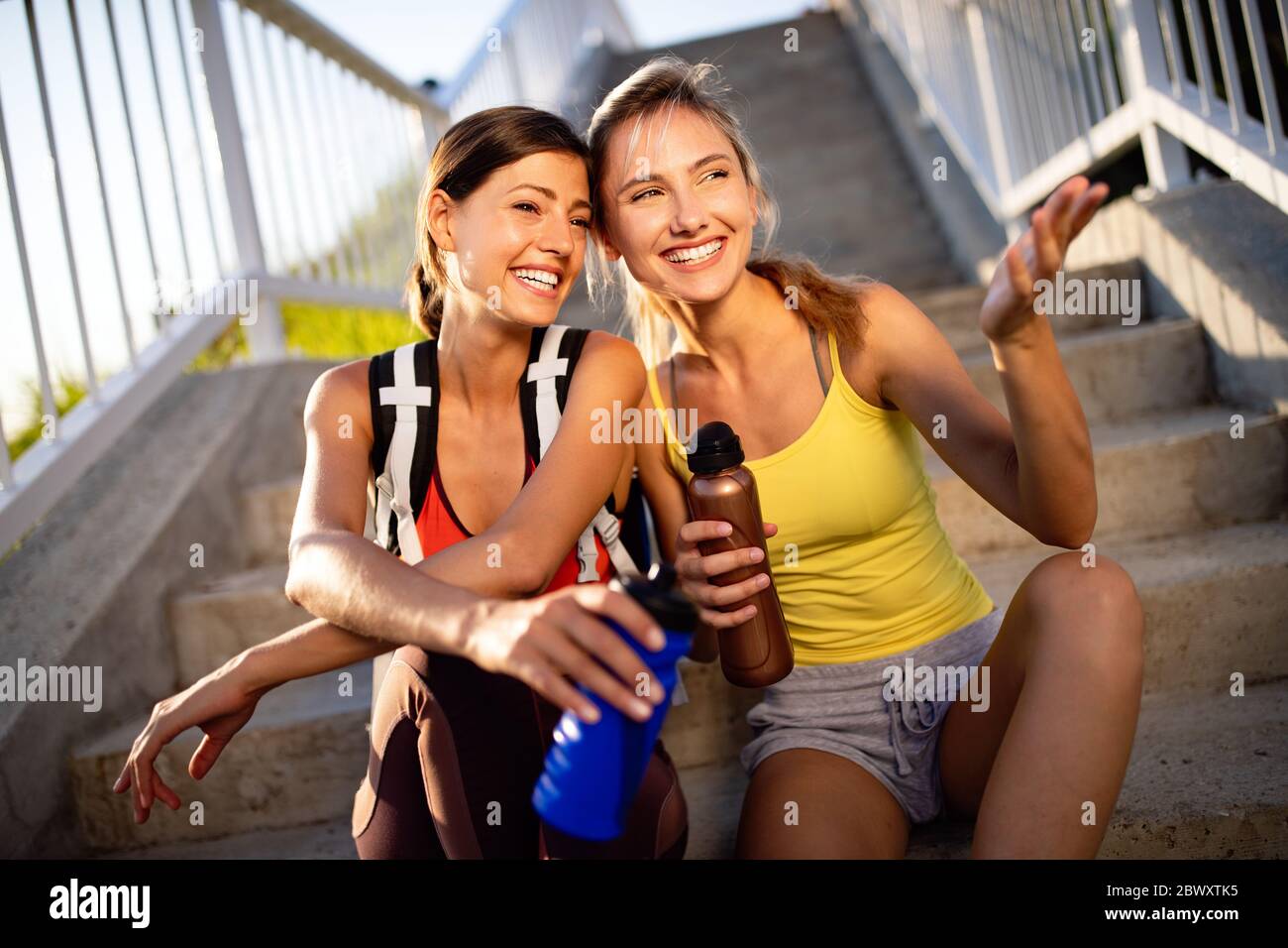 Fitness, sport, people, exercising and healthy lifestyle concept. Happy ...