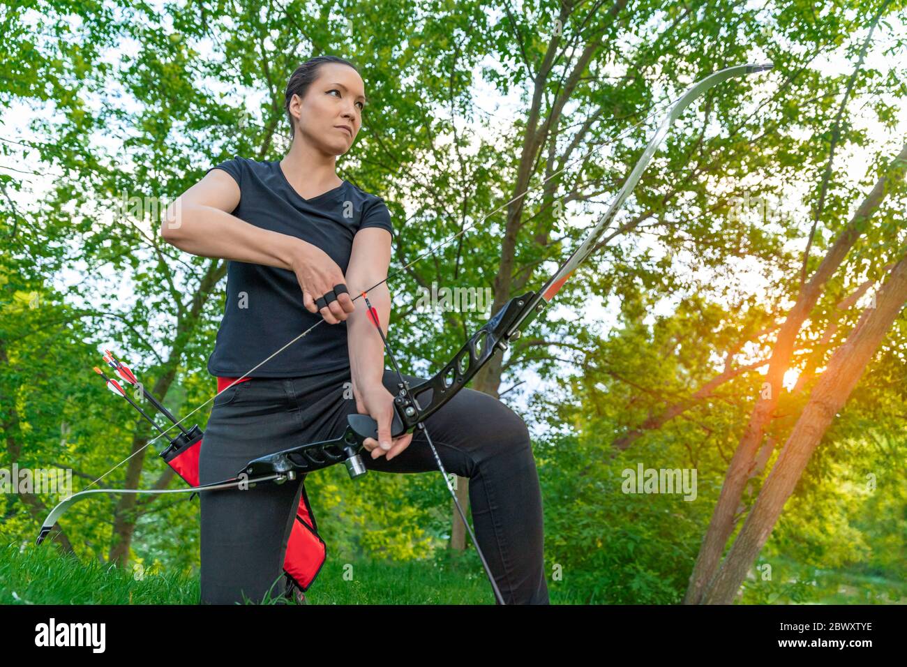 arrow shooting from a bow in nature, sport archery. copy space Stock ...